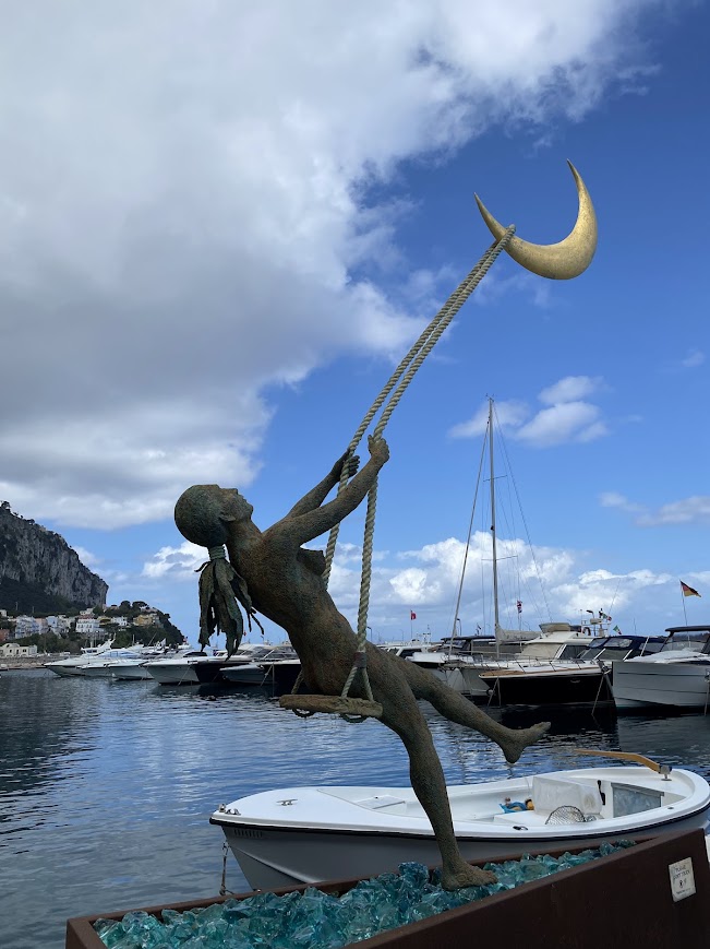 Photo - Italy - Capri - Swing from the Moon Statue | Wanderlust Social