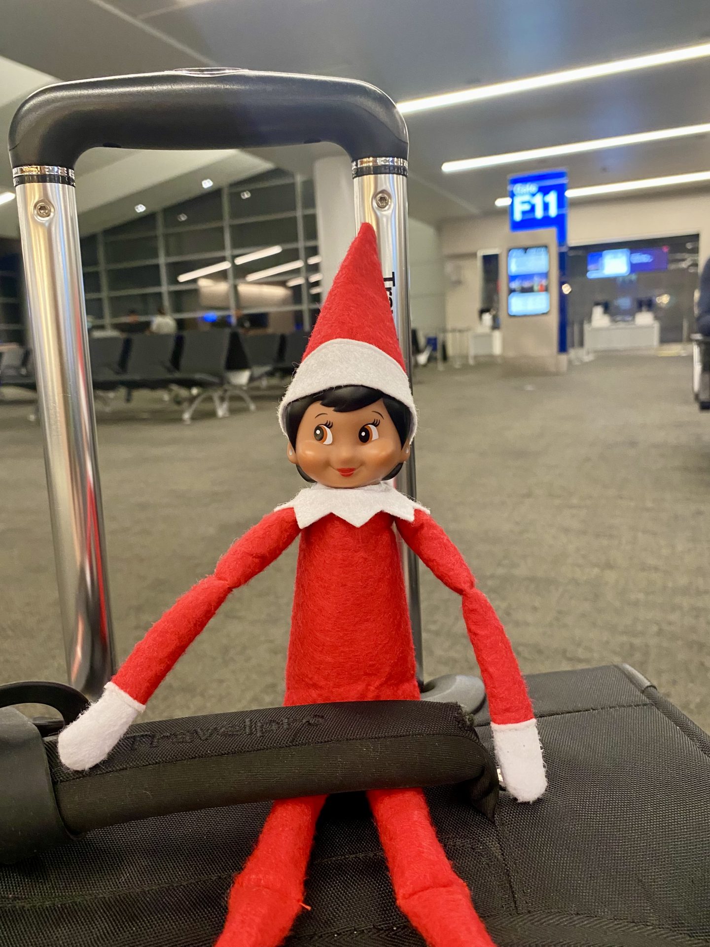 The Elf Travels The World - Elf at the Airport - WLS | Wanderlust Social
